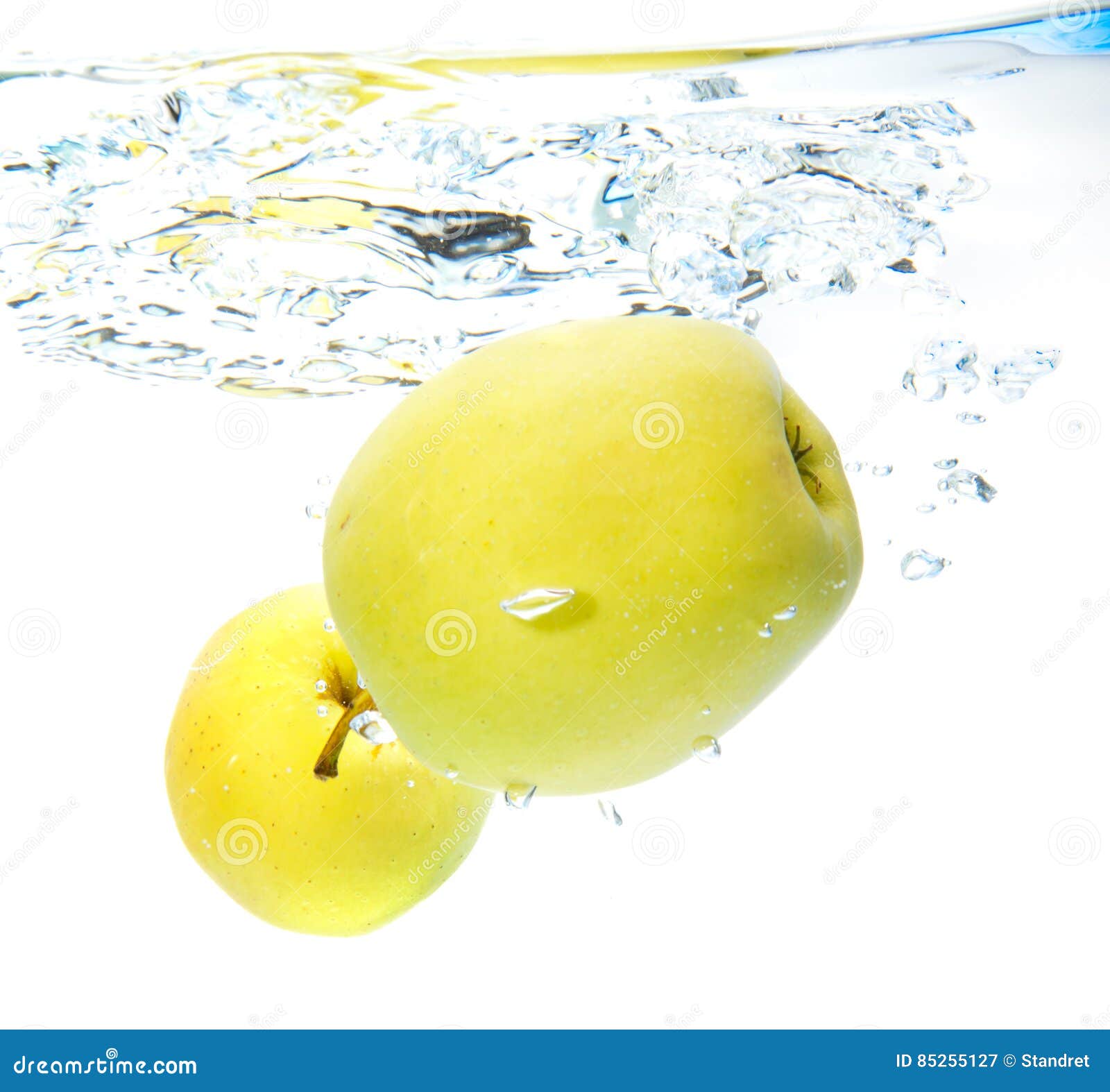 Apple in water stock image. Image of juice, light, fruit - 85255127