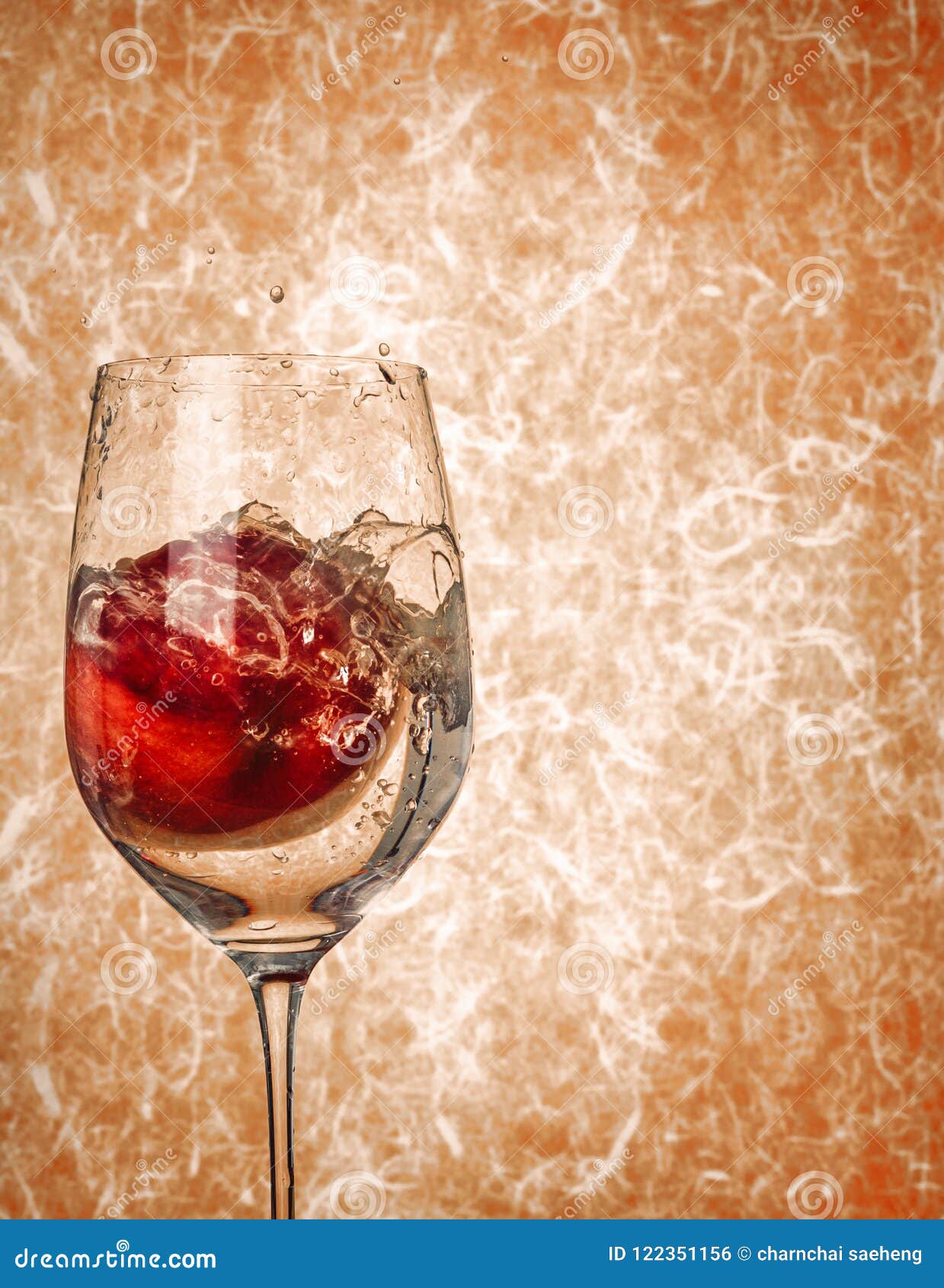 An Apple in Wine Glass with a Water Splash. Stock Photo - Image of ...