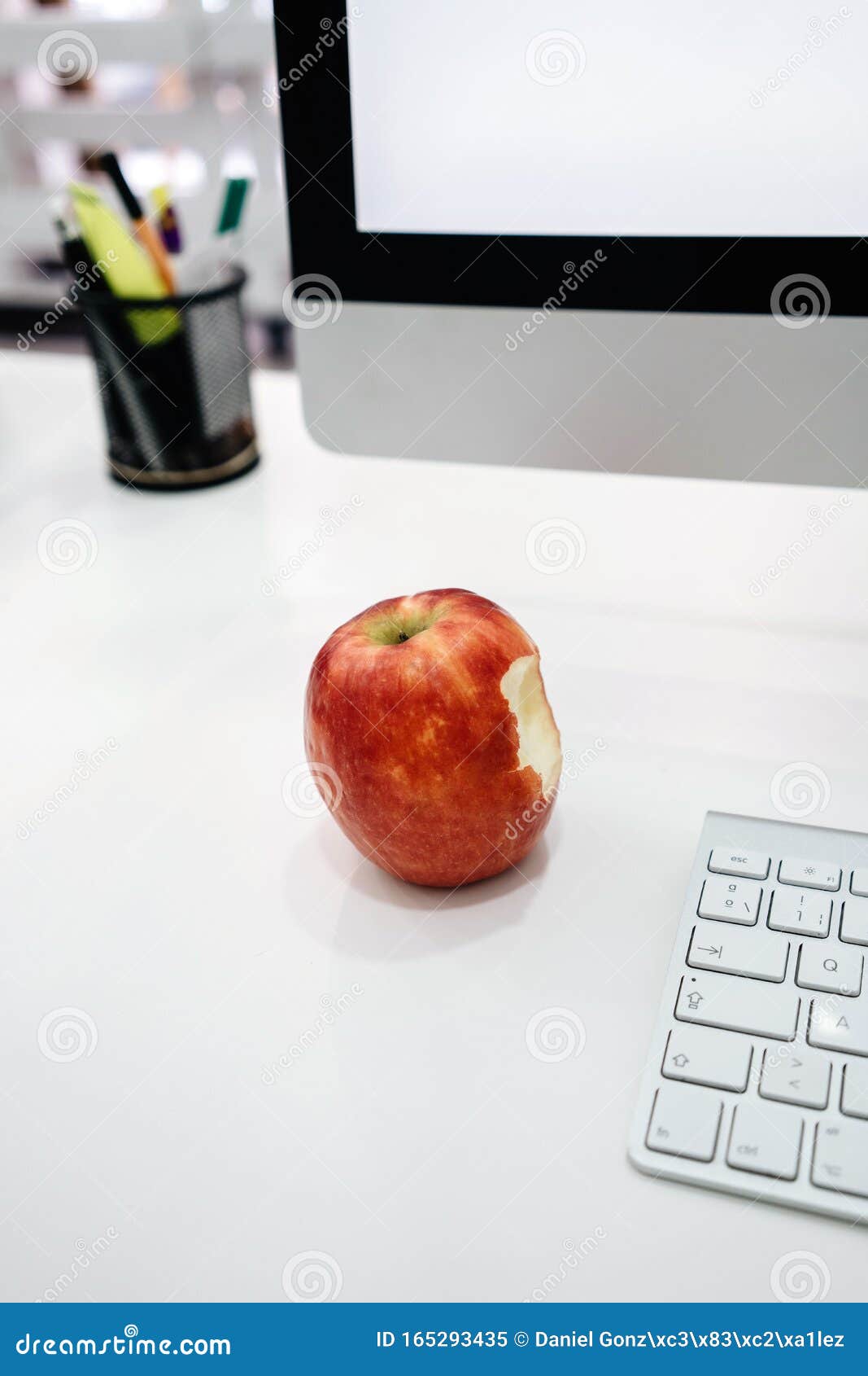 Apple at work office stock image. Image of hand, coffee - 165293435