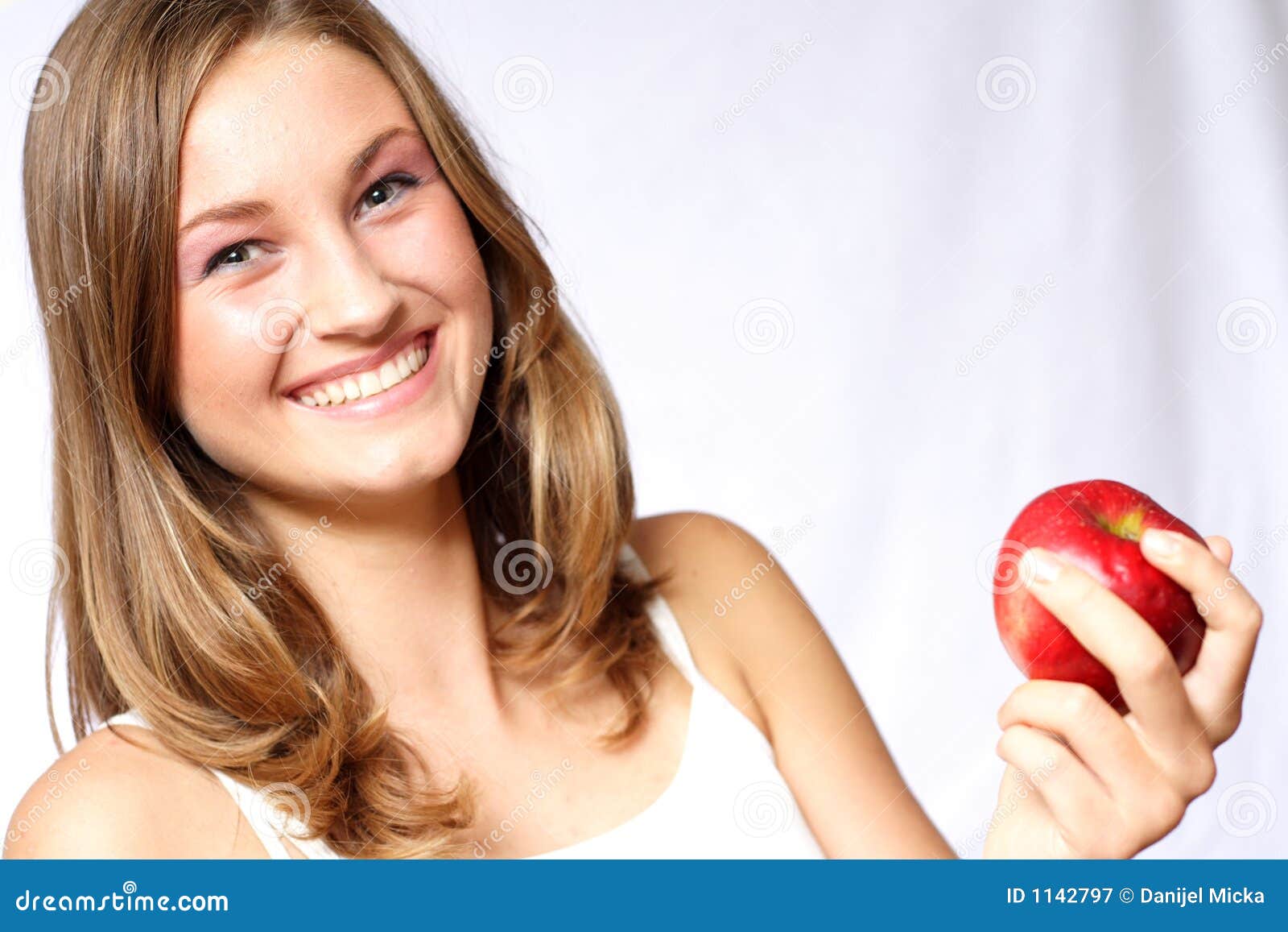 Apples stock image. Image of girl, female, fruit, face - 1142797