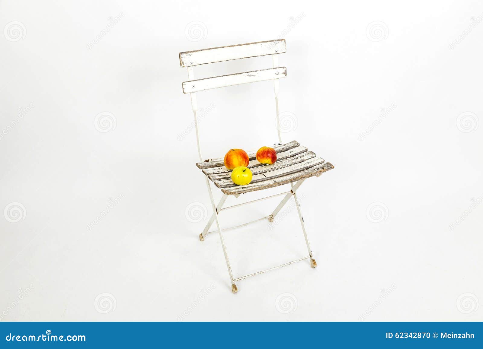 Apples on Chair in Studio on White Background Isolate Stock Photo ...