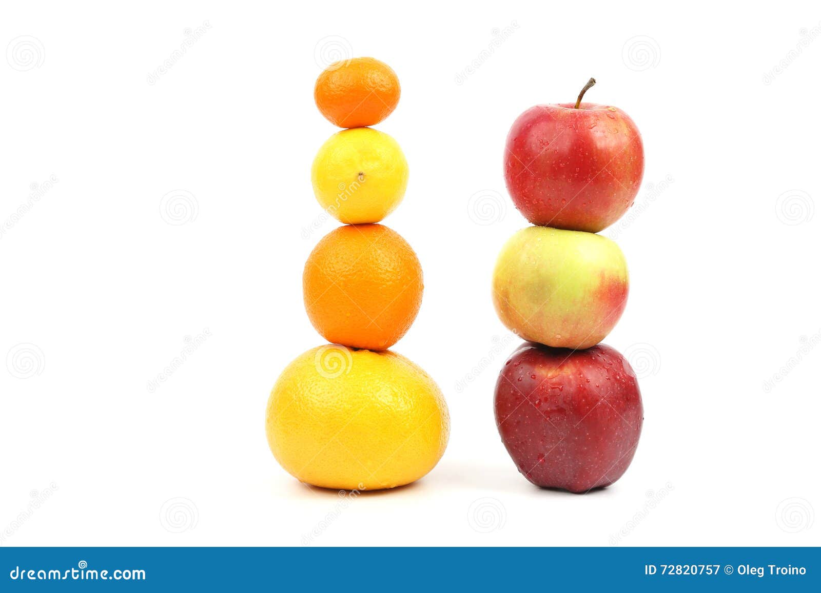 Apples and Citrus Stand Vertically on Each Other on White Background ...