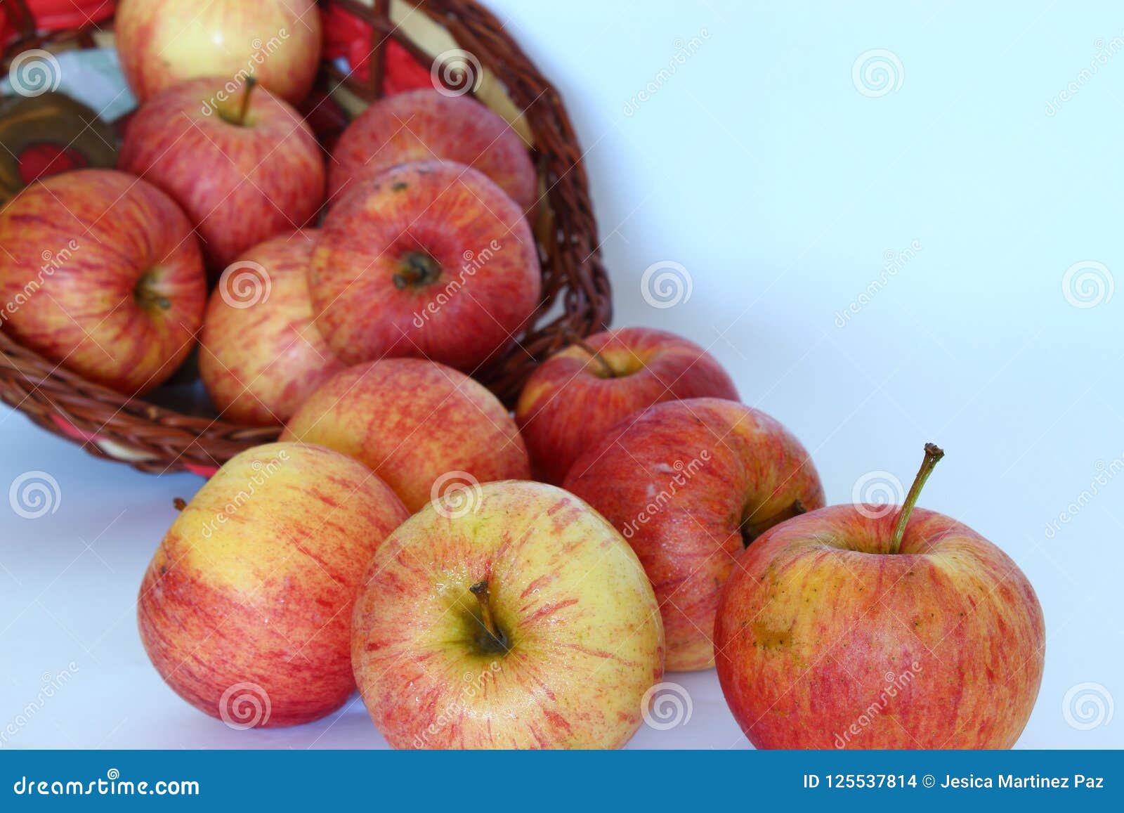 Apples Falling Out of the Basket. Stock Photo - Image of bright, grass ...