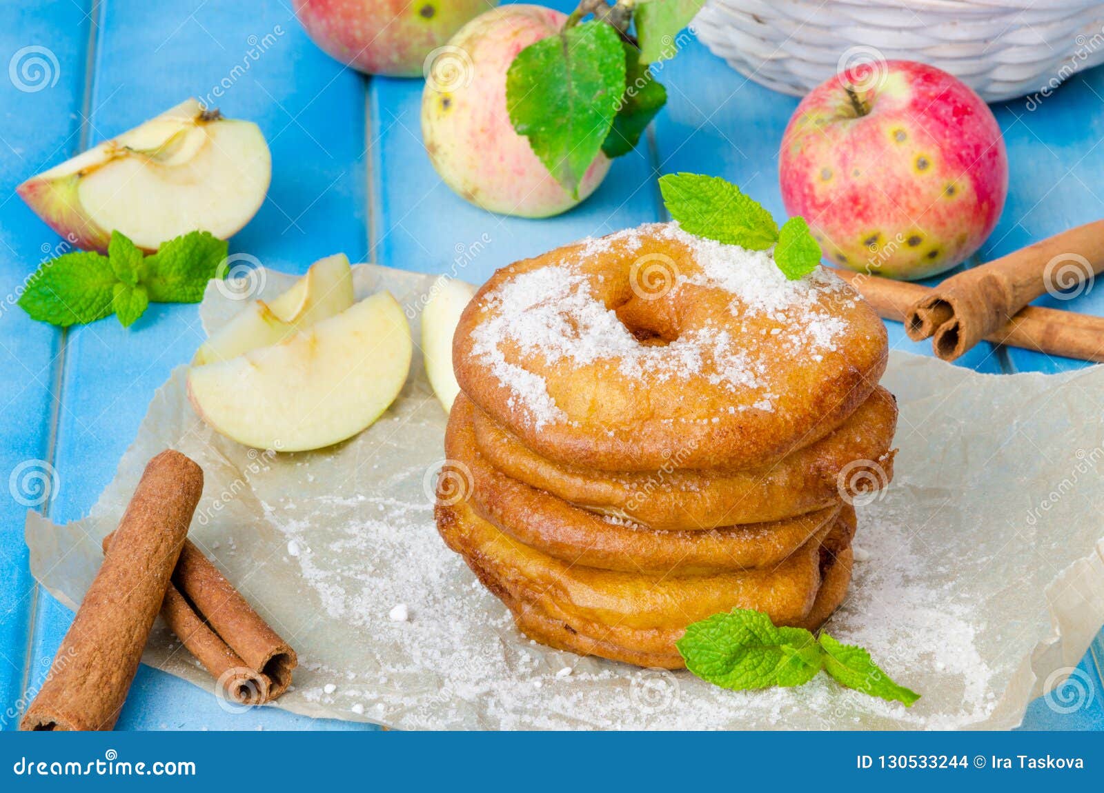 Apples Fried in a Batter with Cinnamon and Powdered Sugar Stock Photo ...