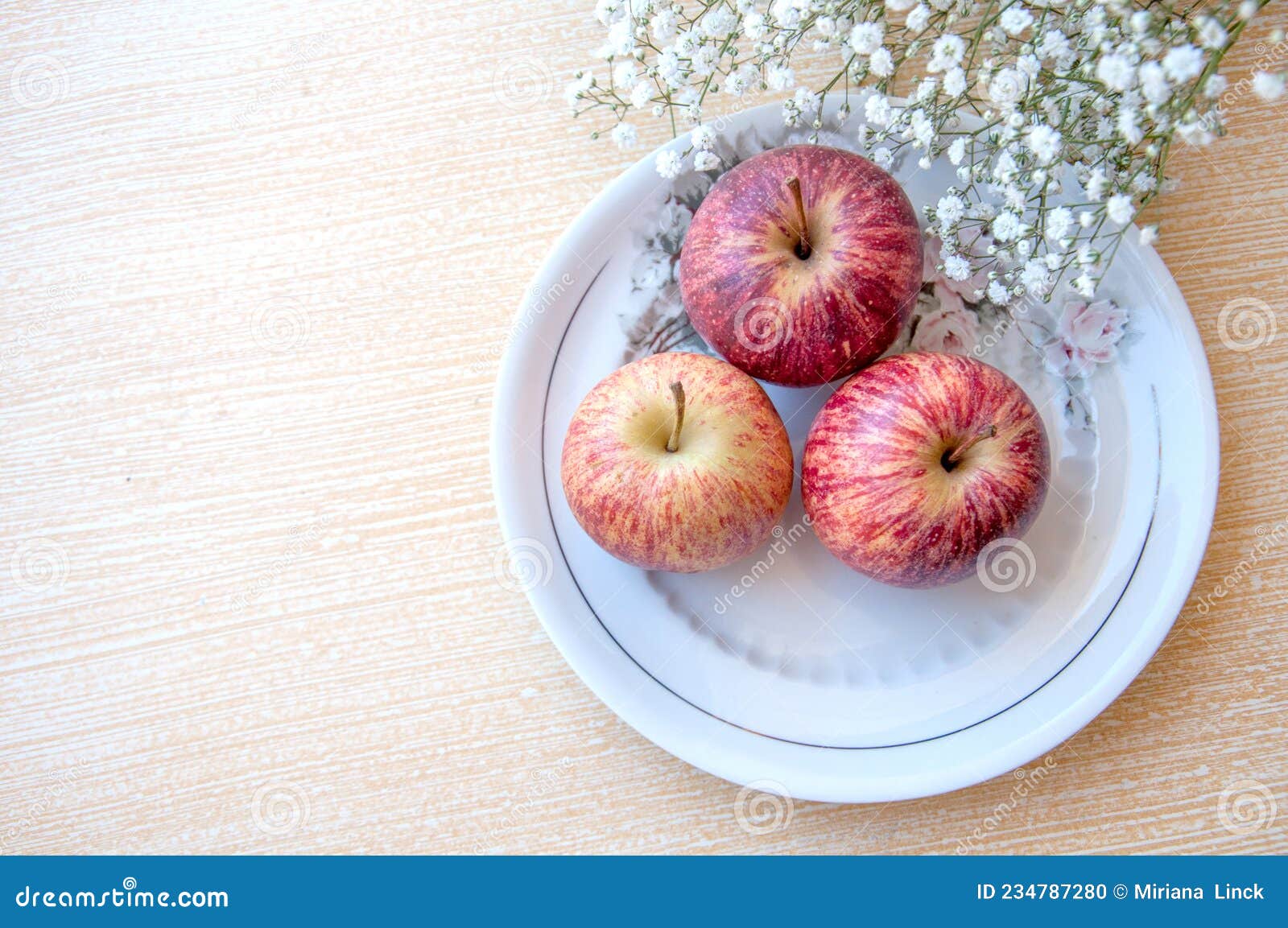 Apples inside a white dish stock photo. Image of ripe - 234787280