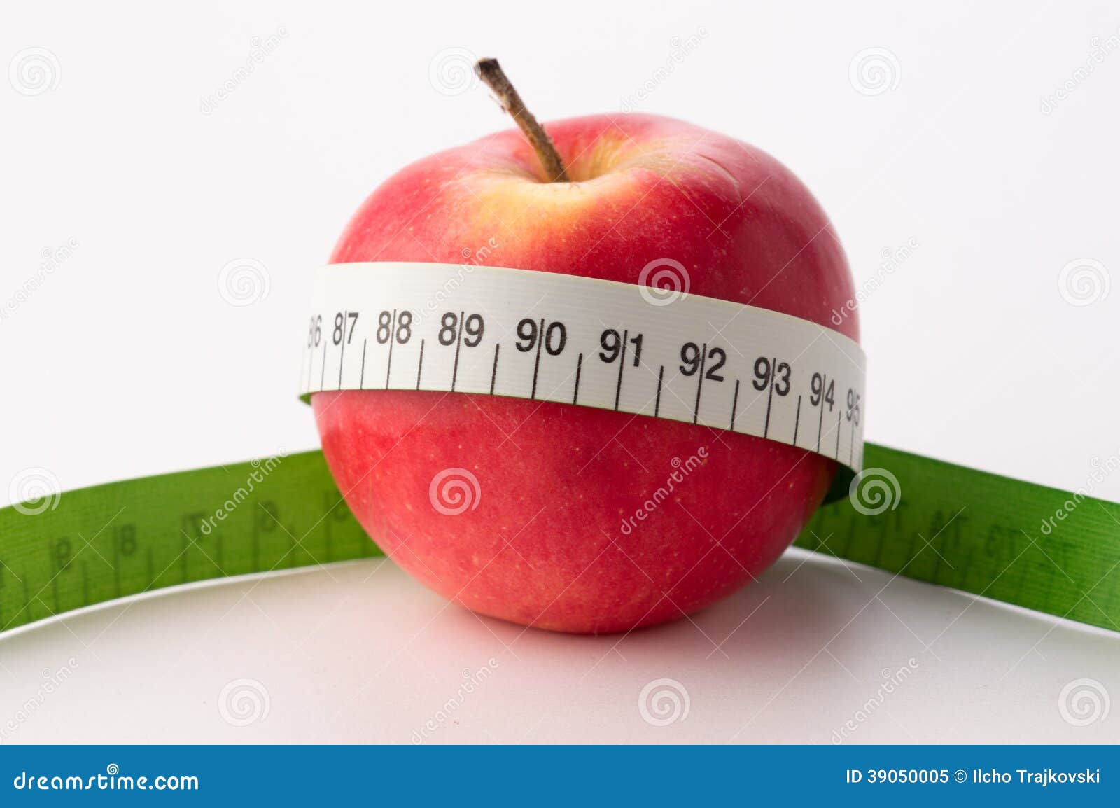 Apples with measure tape stock image. Image of bright - 39050005