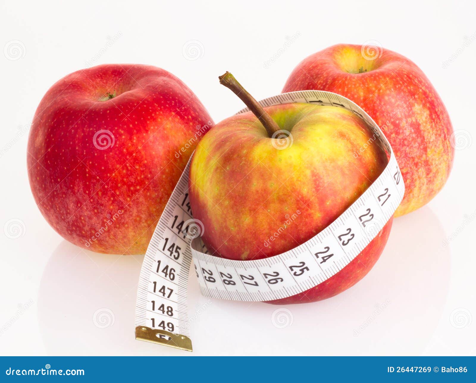 Apples with measuring tape stock image. Image of reflective - 26447269