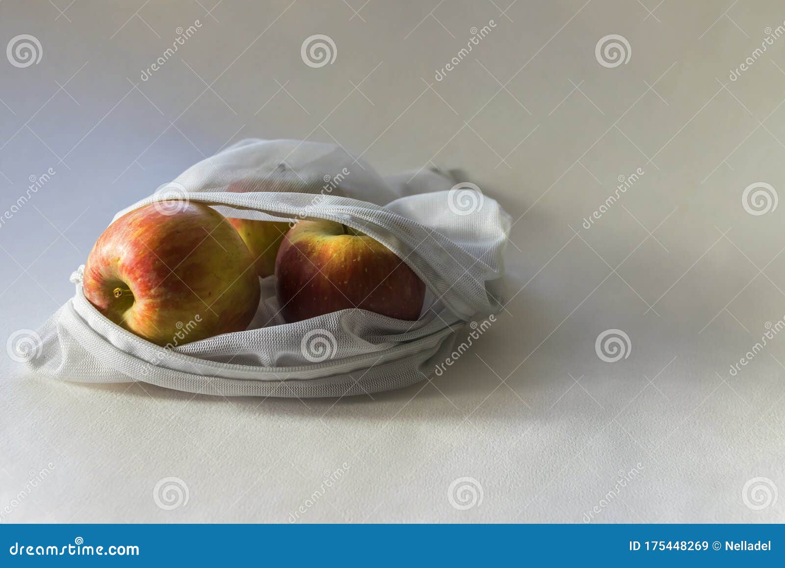 Apples in Mesh Bag in the Sunlight with Shadows Stock Image - Image of ...