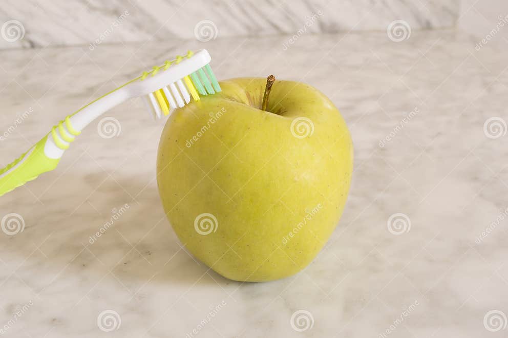Apples with a toothbrush stock photo. Image of apples - 30760748