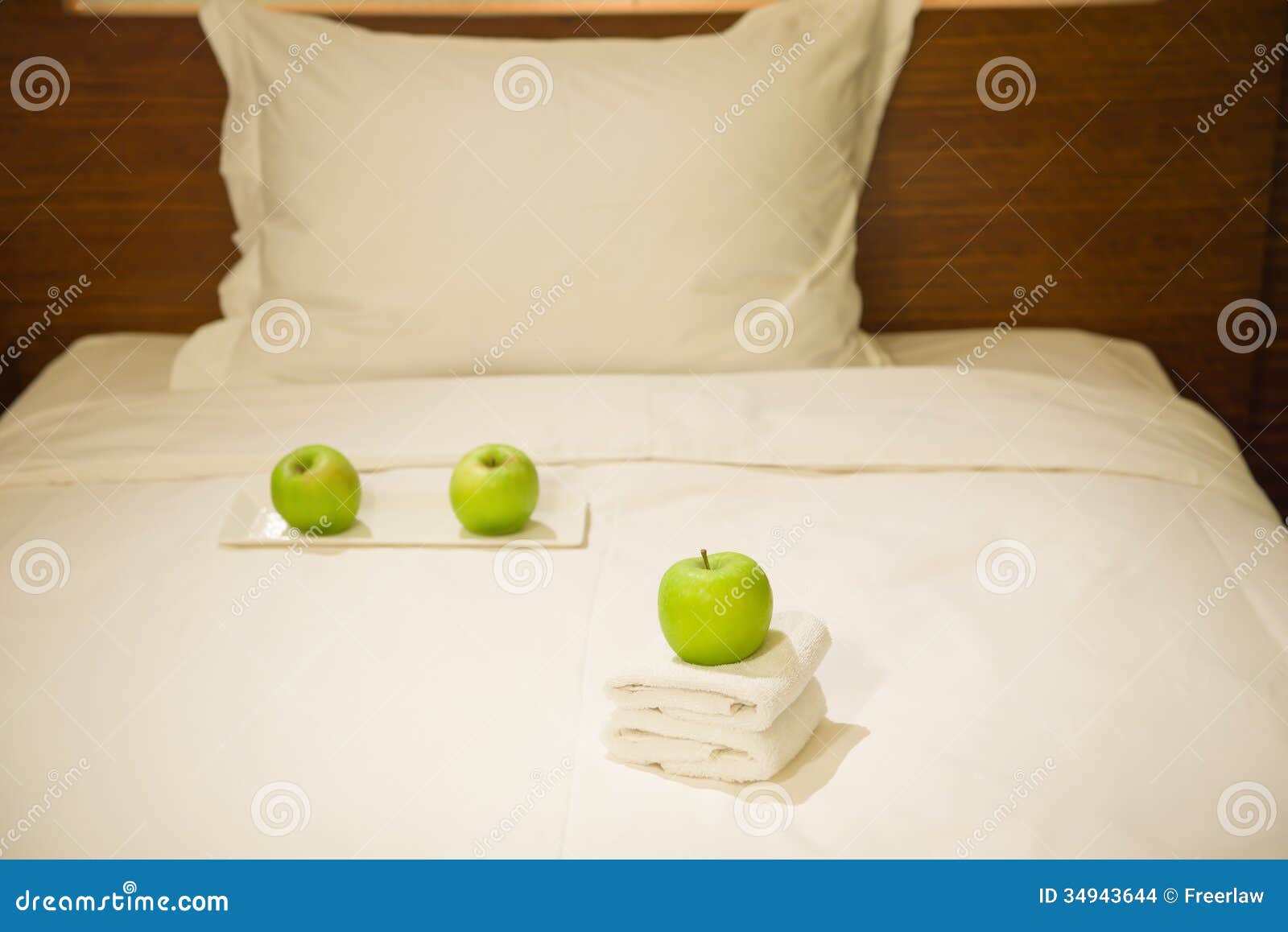 Apples and towels on bed stock photo. Image of cozy, fluffy - 34943644