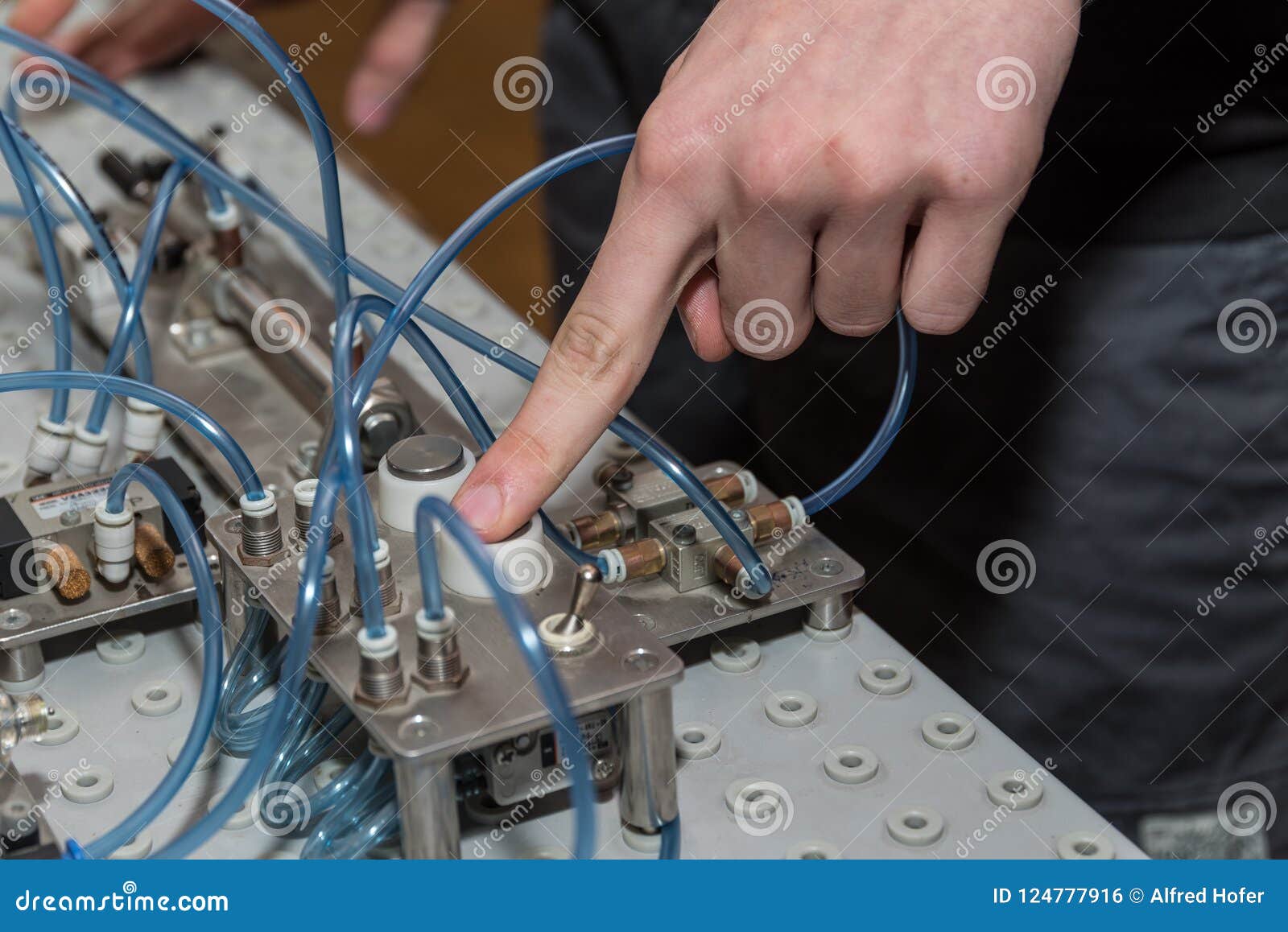 Trigger Pneumatics Application with the Push of a Button Stock Photo ...