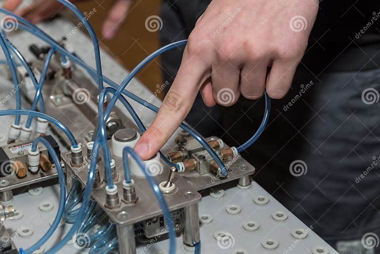Trigger Pneumatics Application with the Push of a Button Stock Photo ...