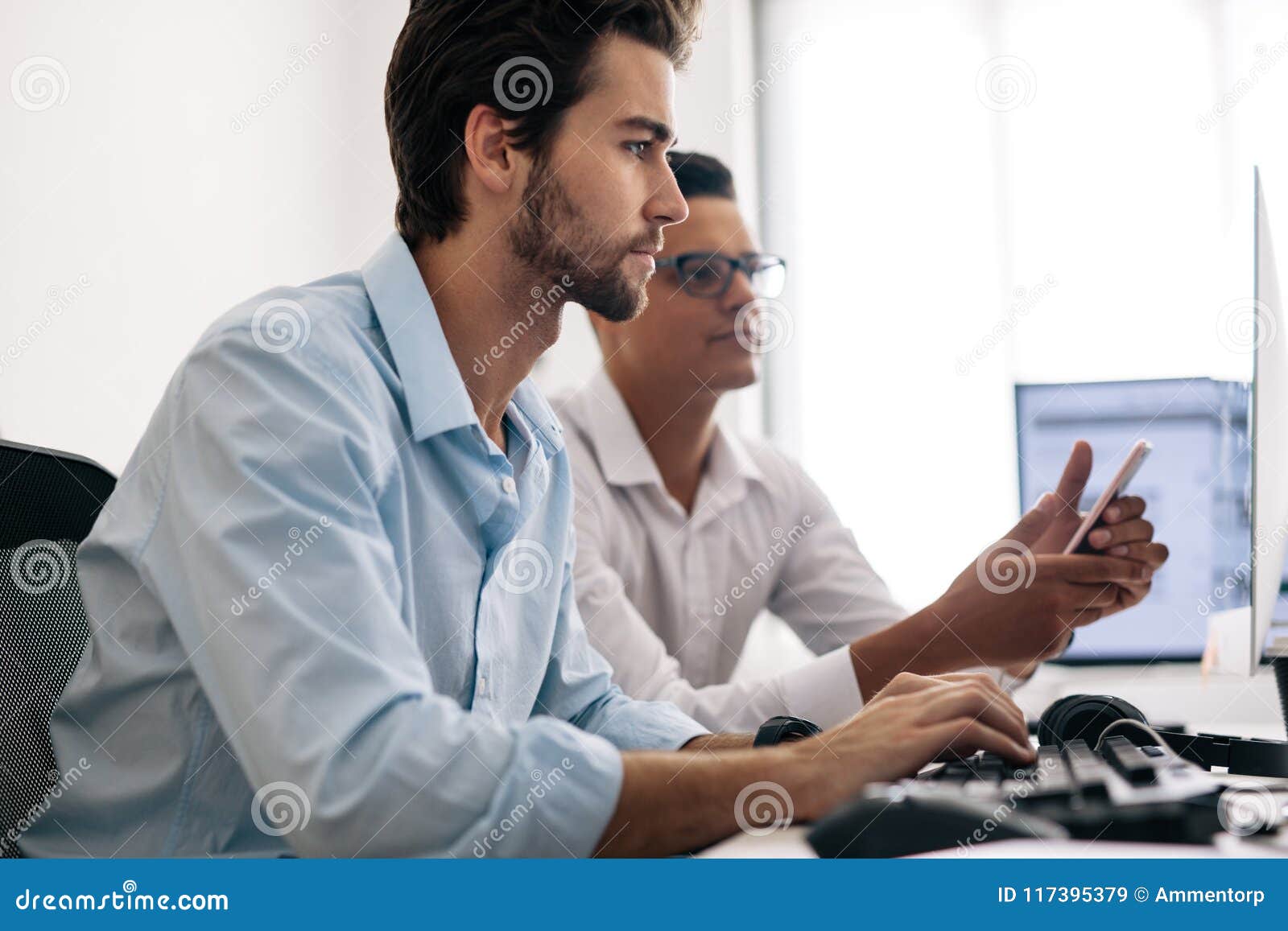 Application Developers Working On Computers In Office Stock Image Image Of Mobile Technology