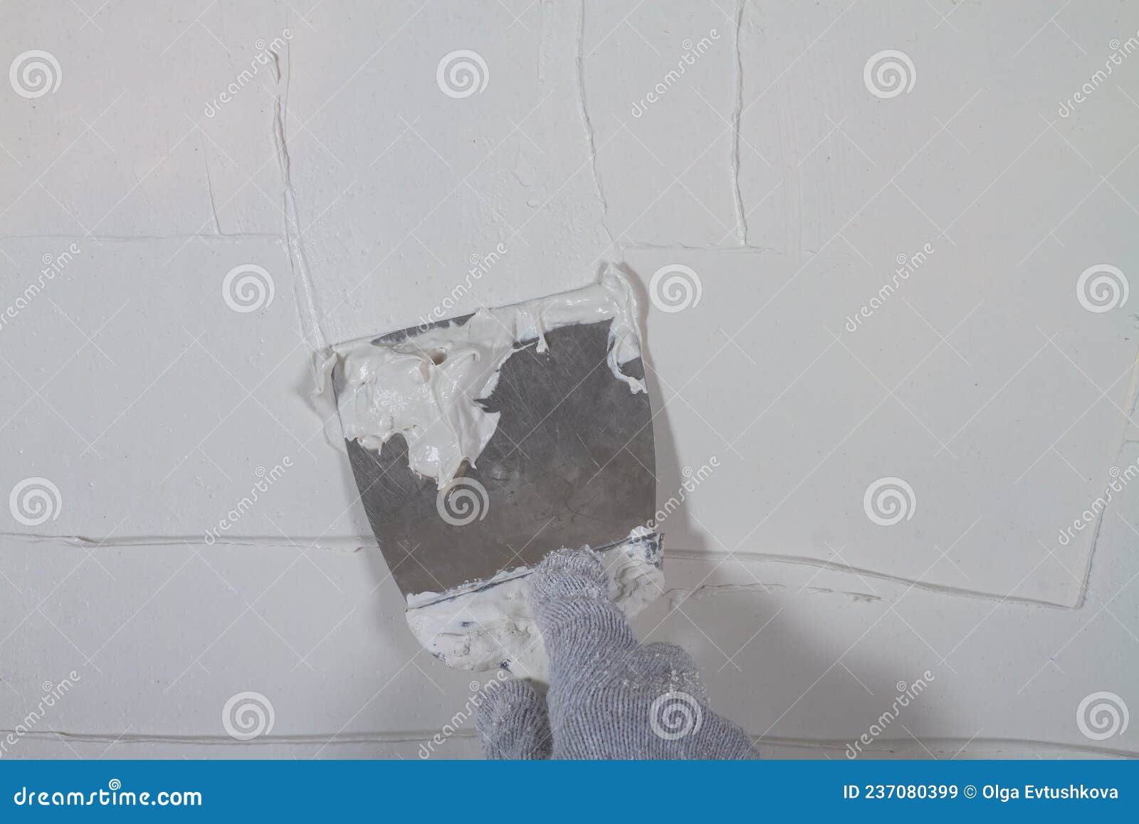 Apply Plaster White Putty on a Concrete Wall with a Spatula Stock Image ...