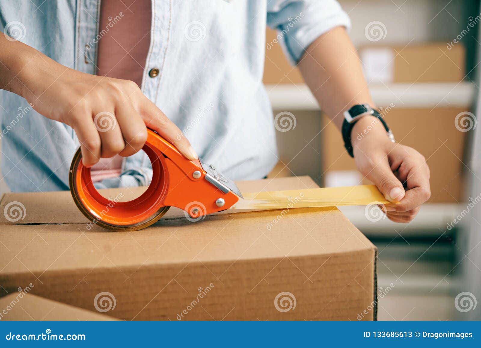 Applying adhesive tape stock image. Image of office - 133685613