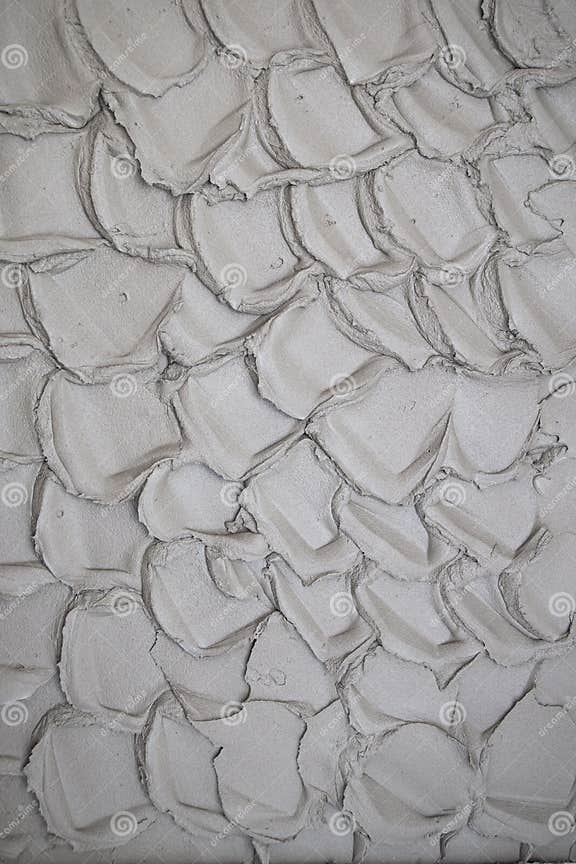 Applying Cement Plaster in a Thick Layer on a Concrete Wall by a ...