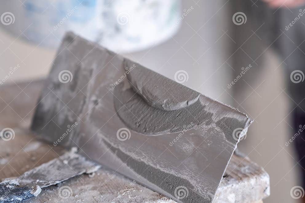 Applying Decorative Putty. White Abstract Texture of Surface Covered ...