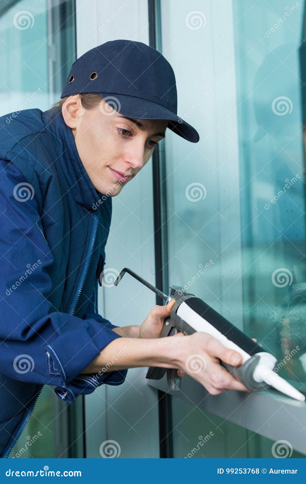 Applying epoxy to window stock photo. Image of fasten - 99253768
