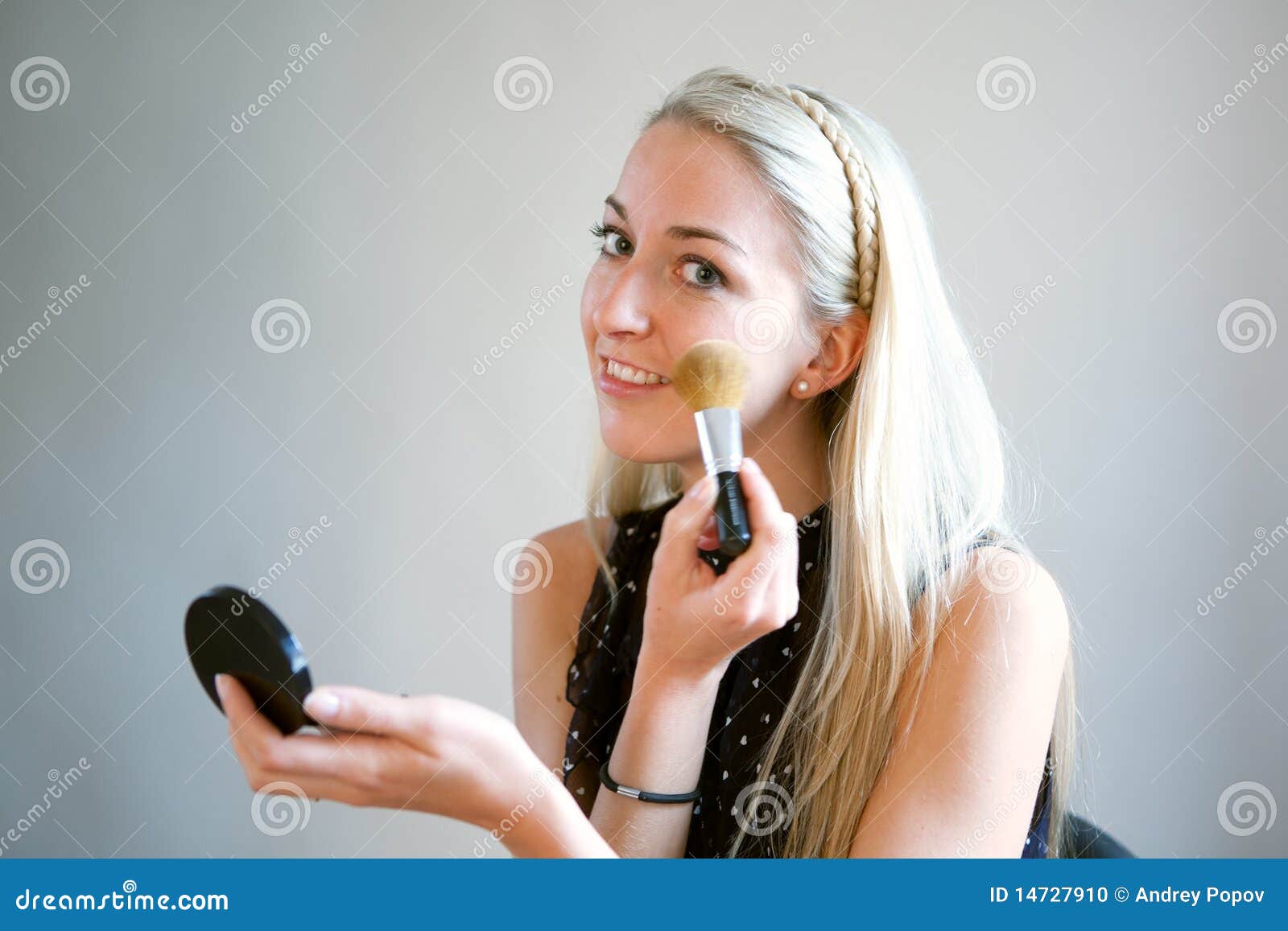 Applying face powder stock photo. Image of smiling, cosmetics - 14727910