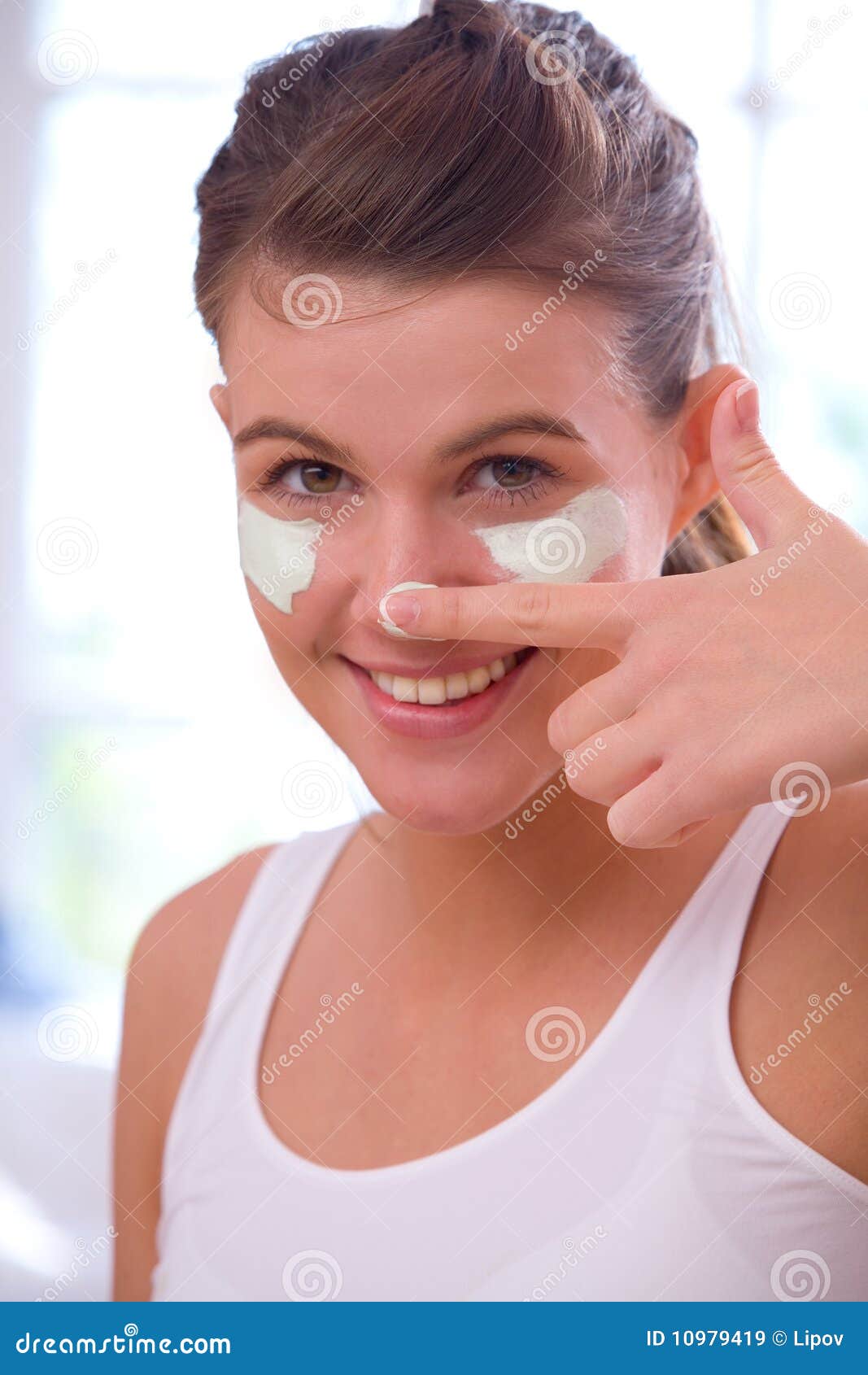 Applying facial mask stock image. Image of perfection - 10979419