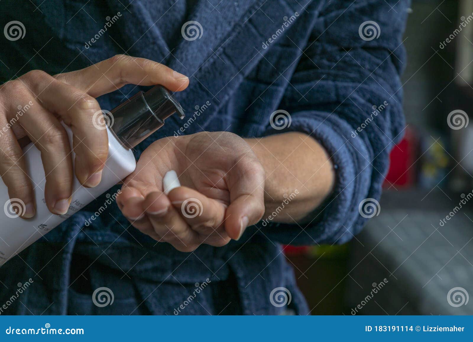 Applying Hand Lotion stock photo. Image of fingers, hands - 183191114