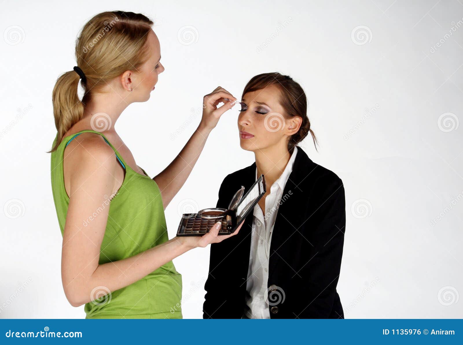 Applying Make Up stock photo. Image of putting, brush - 1135976