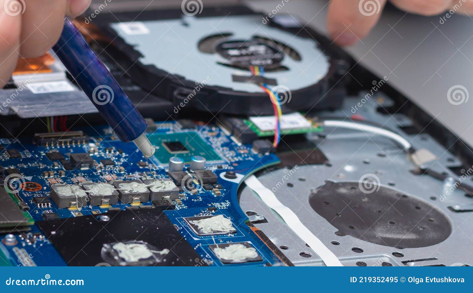 Applying a New Thermal Paste To the Laptop Cooling System from a Tube ...