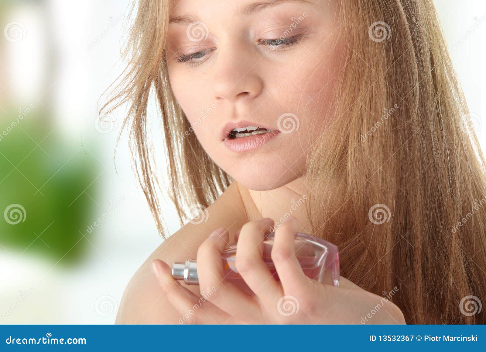 Applying perfume stock image. Image of glamor, bottle - 13532367