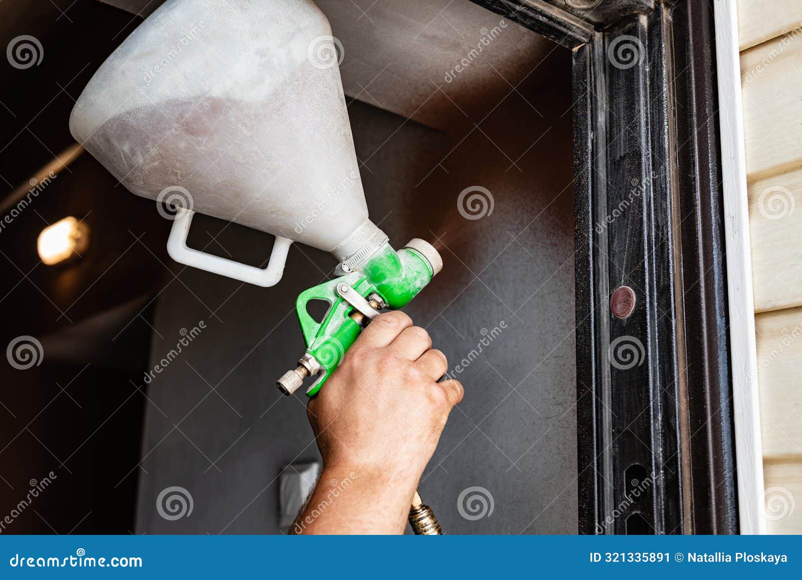 Applying a Primer To the Wall Using Spray Gun. Stock Image - Image of ...