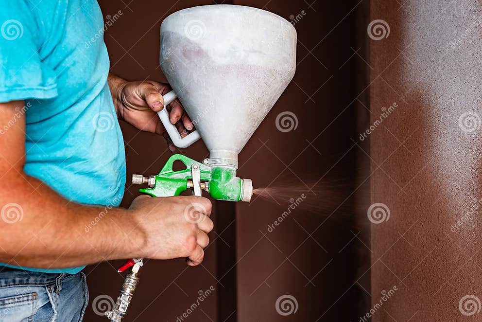 Applying a Primer To the Wall Using Spray Gun. Stock Photo - Image of ...