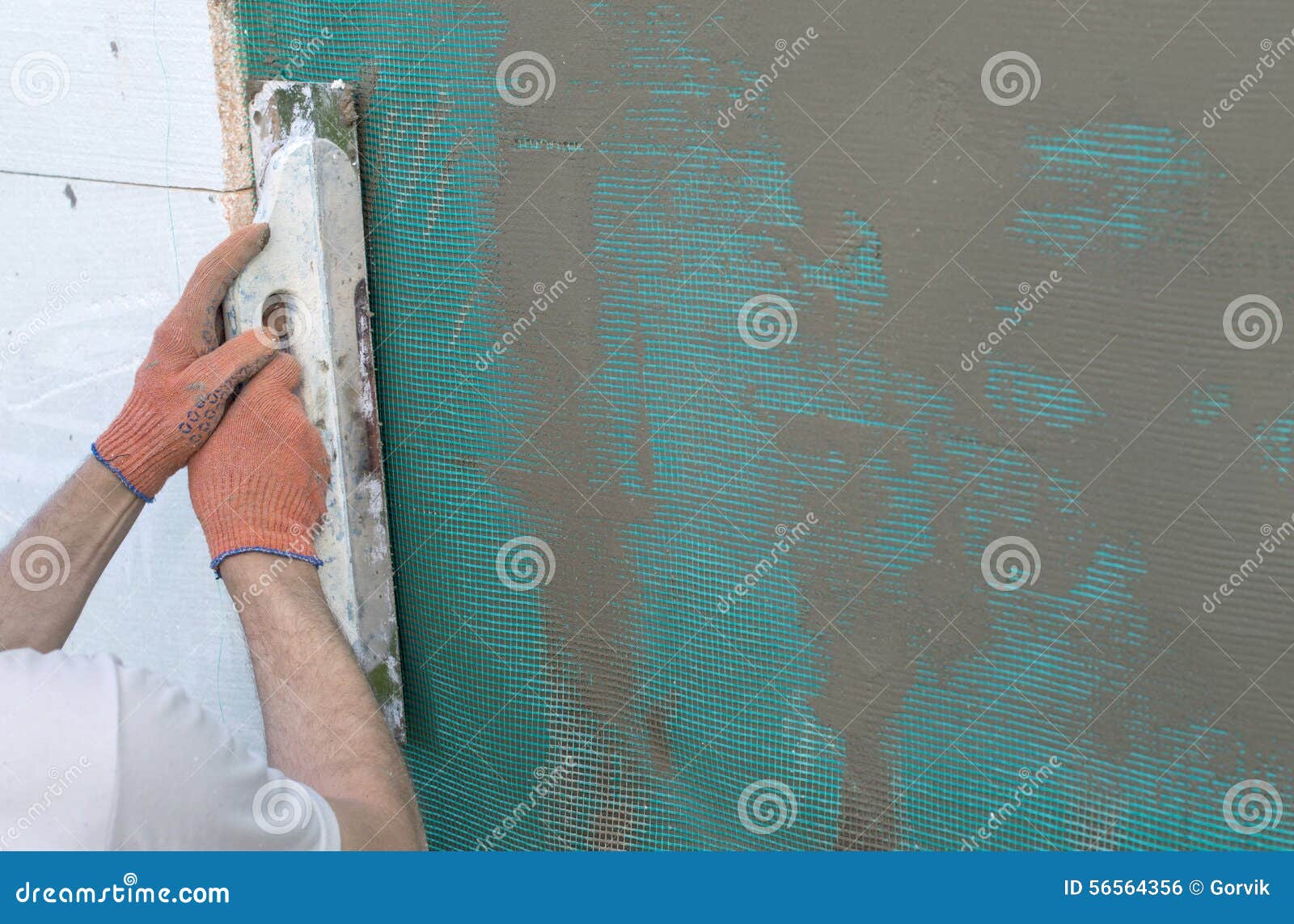 Applying Putty To the Wall Using a Spatula Stock Photo - Image of ...
