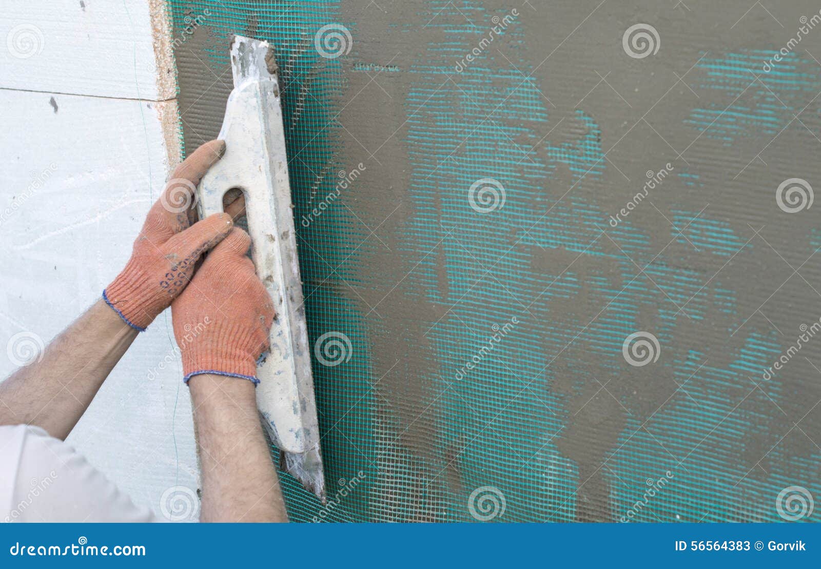 Applying Putty To the Wall Using a Spatula Stock Image - Image of ...