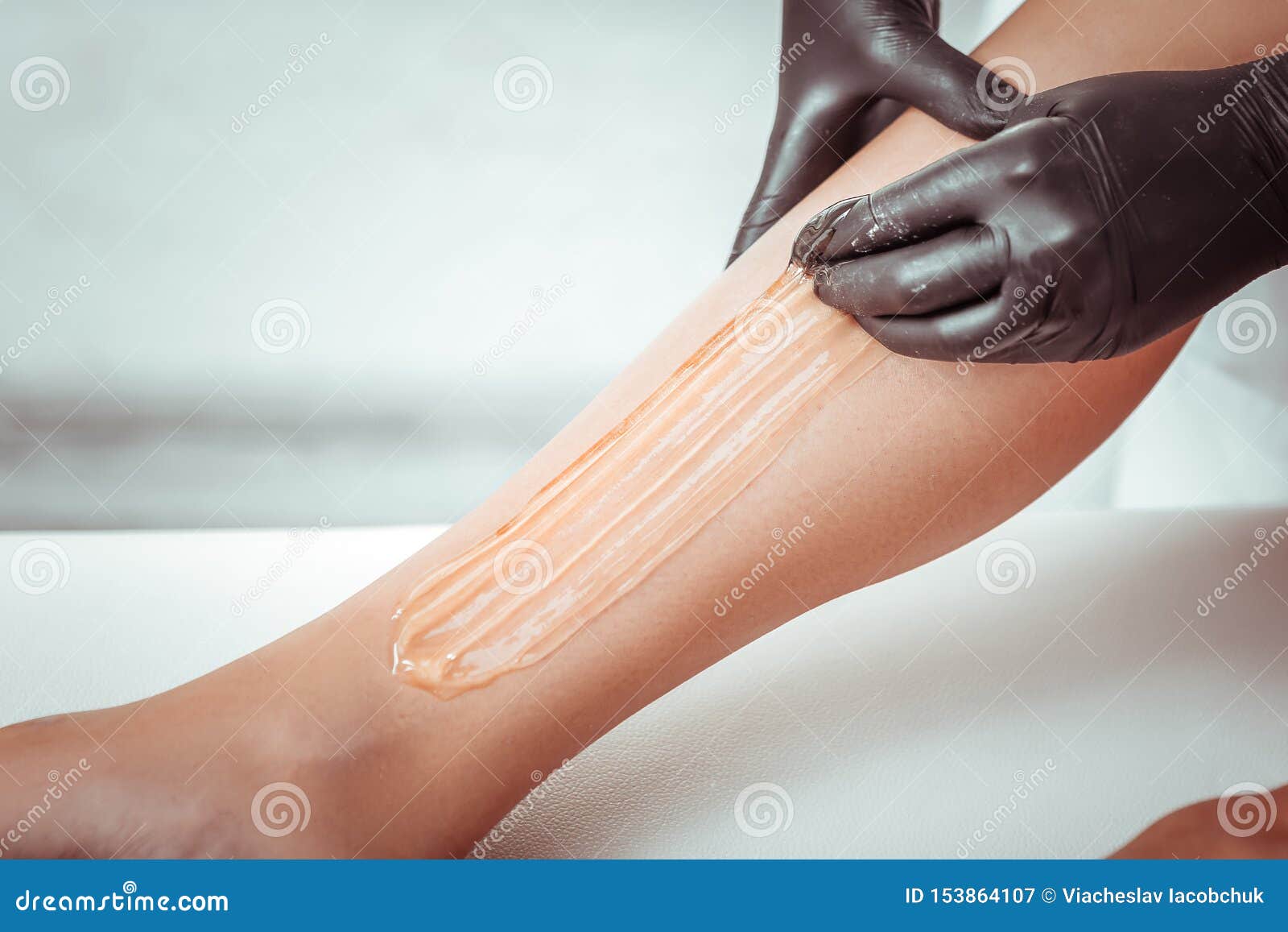 Salon Worker Using New Sugaring Technique for Removing Unwanted Hair ...