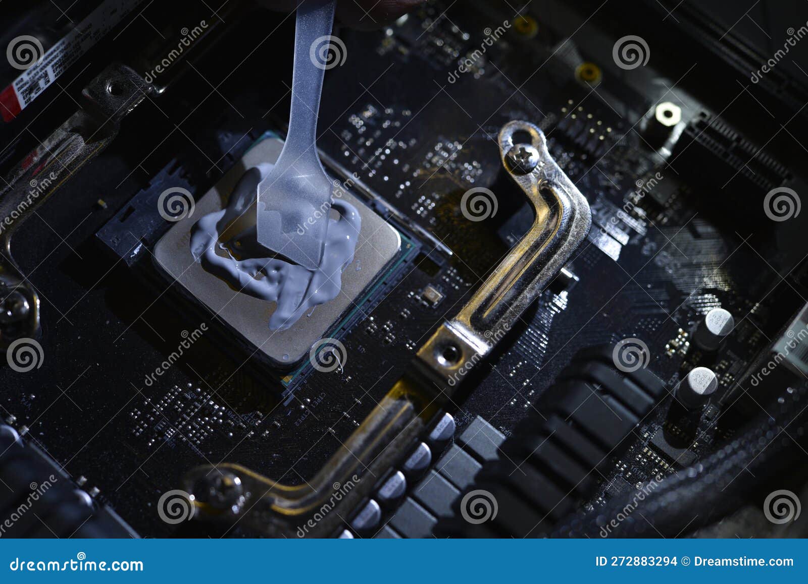 Applying Thermal Paste To the Surface of the Computer Processor ...