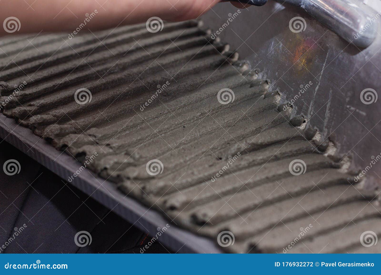 Applying Tile Adhesive on Tile Stock Photo - Image of adhesive ...