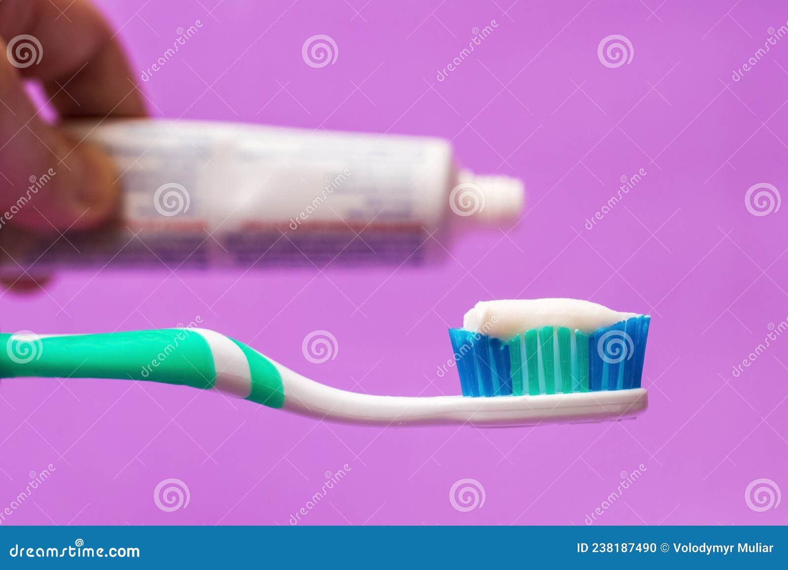Applying Toothpaste on a Toothbrush. Dental Care Stock Photo - Image of ...