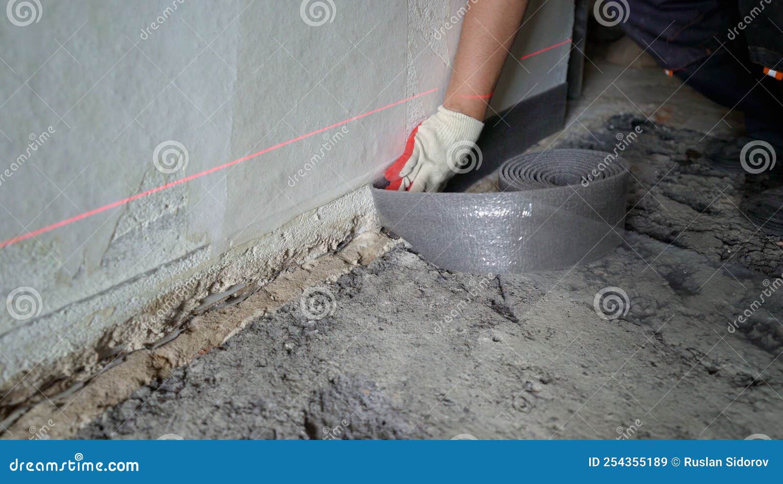 Applying a Waterproofing Tape To the Joint between the Wall and the ...