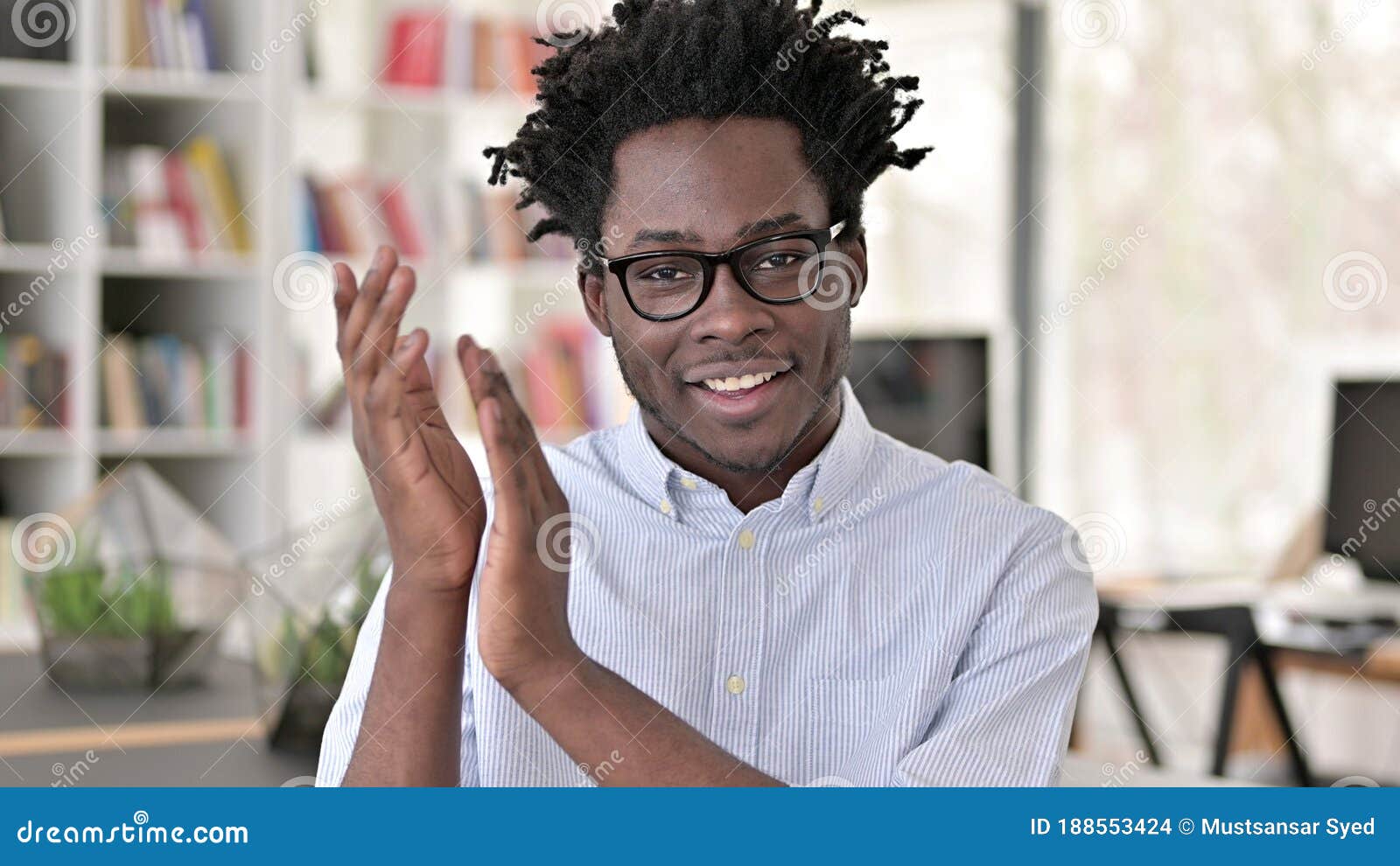 Appreciative Young African Man Clapping Stock Photo - Image of business ...