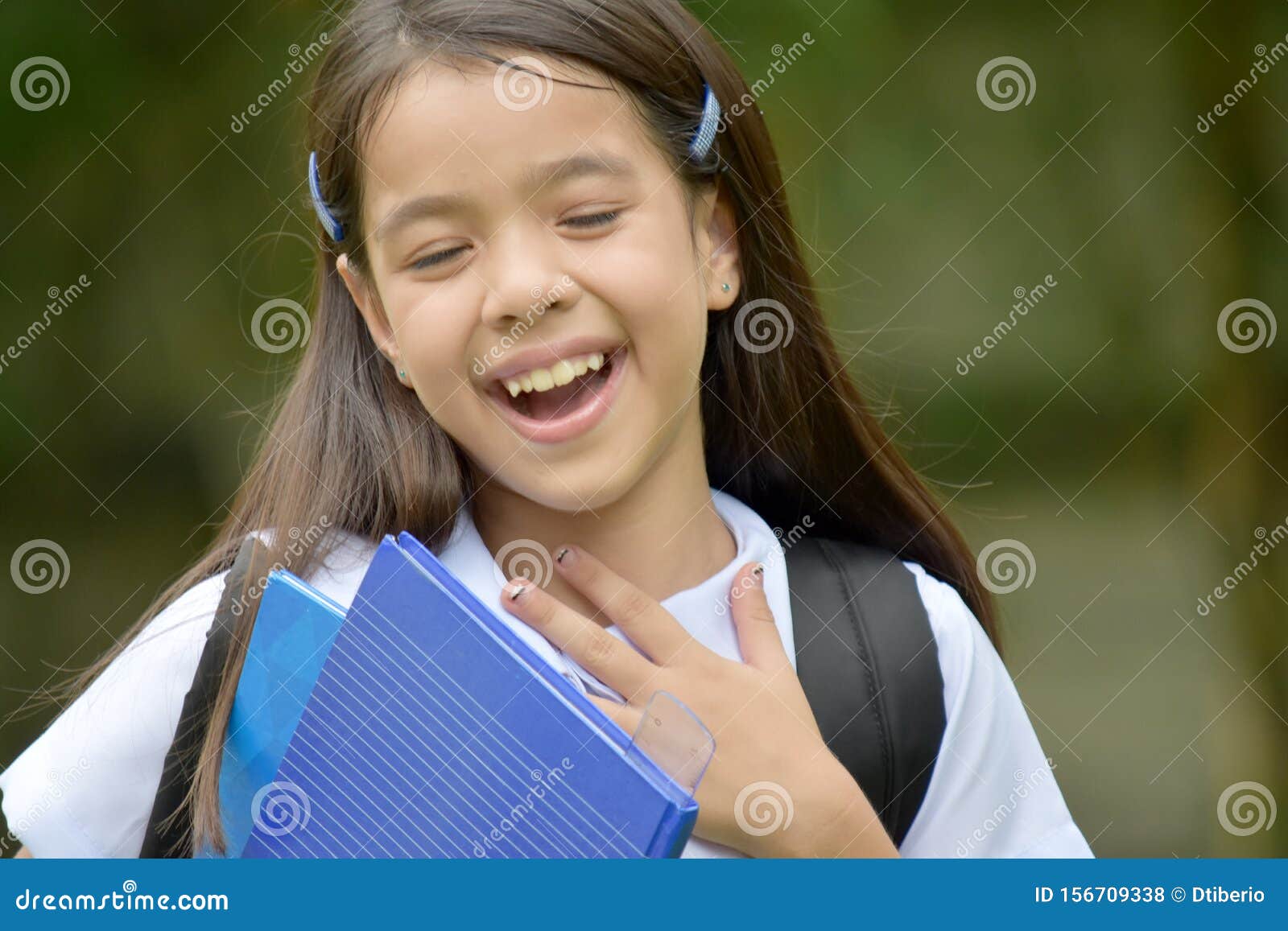 An Appreciative Female Student Wearing Uniform Stock Photo - Image of ...