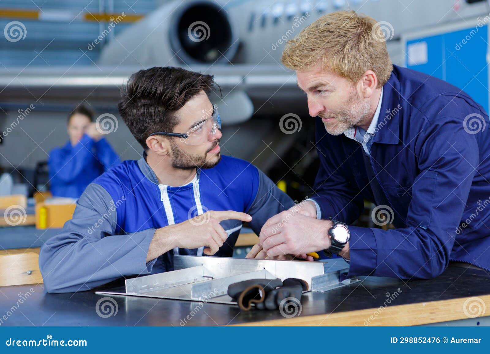 Apprentice Aeronautical Engineer Talking To Supervisor Stock Photo ...