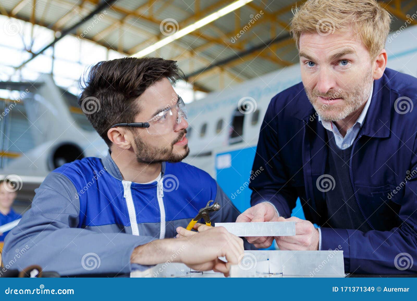 Apprentice Aerospace Engineer Talking To Superior Stock Image - Image ...