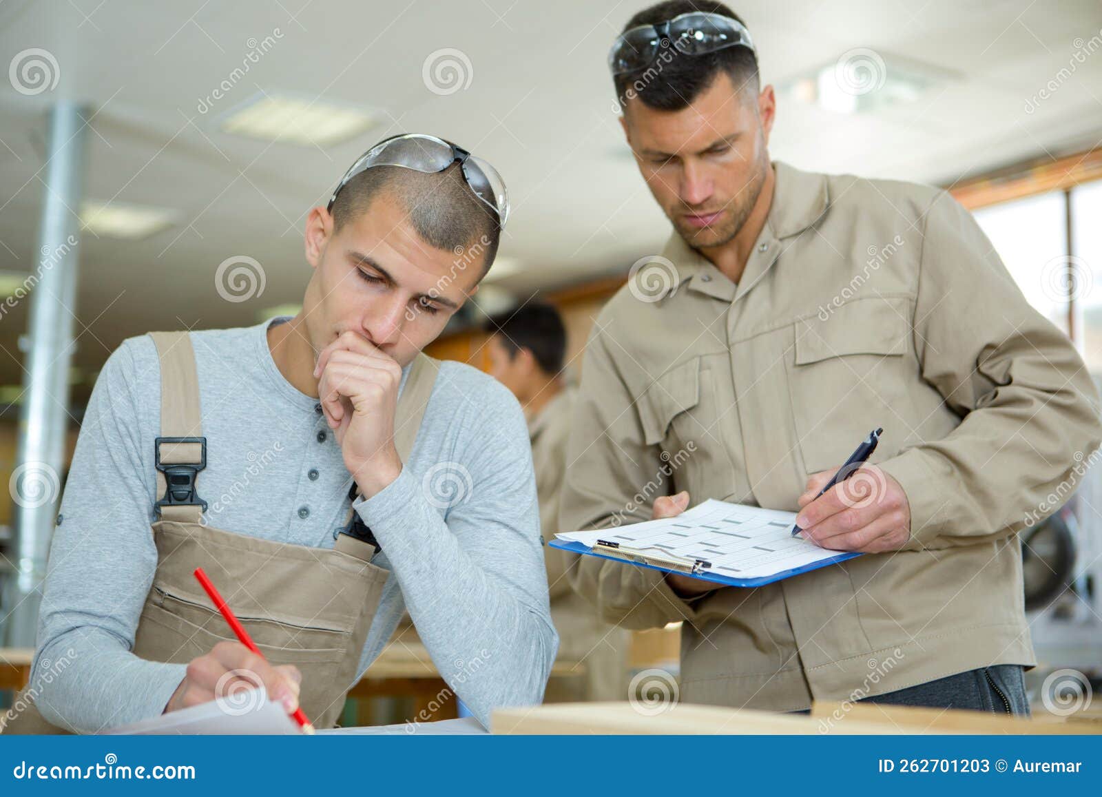 Apprentice Carpenter Taking Notes with Tutor Stock Image - Image of ...
