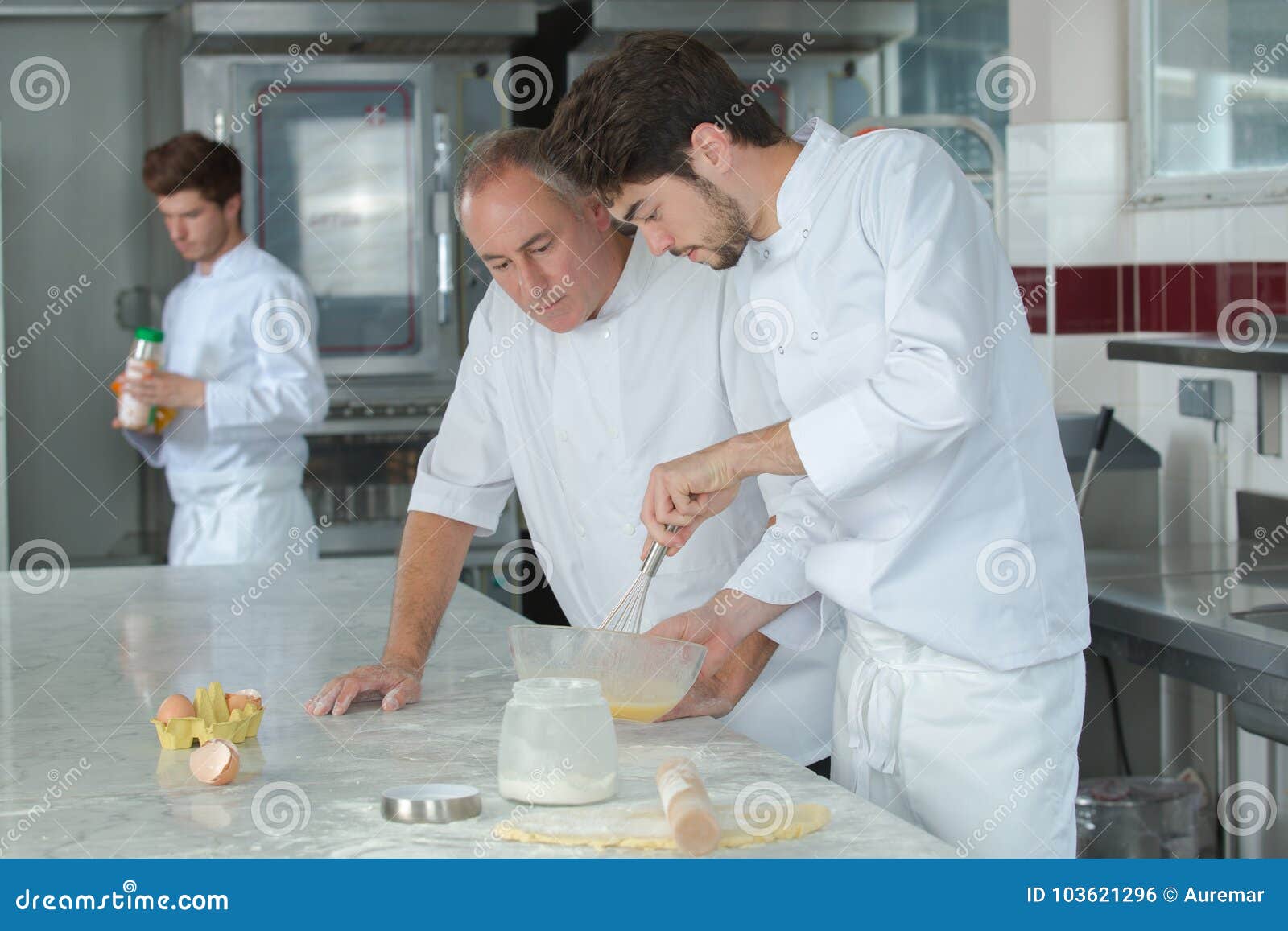 Apprentice Chef Preparing Food in Kitchen at Restaurant Stock Photo ...