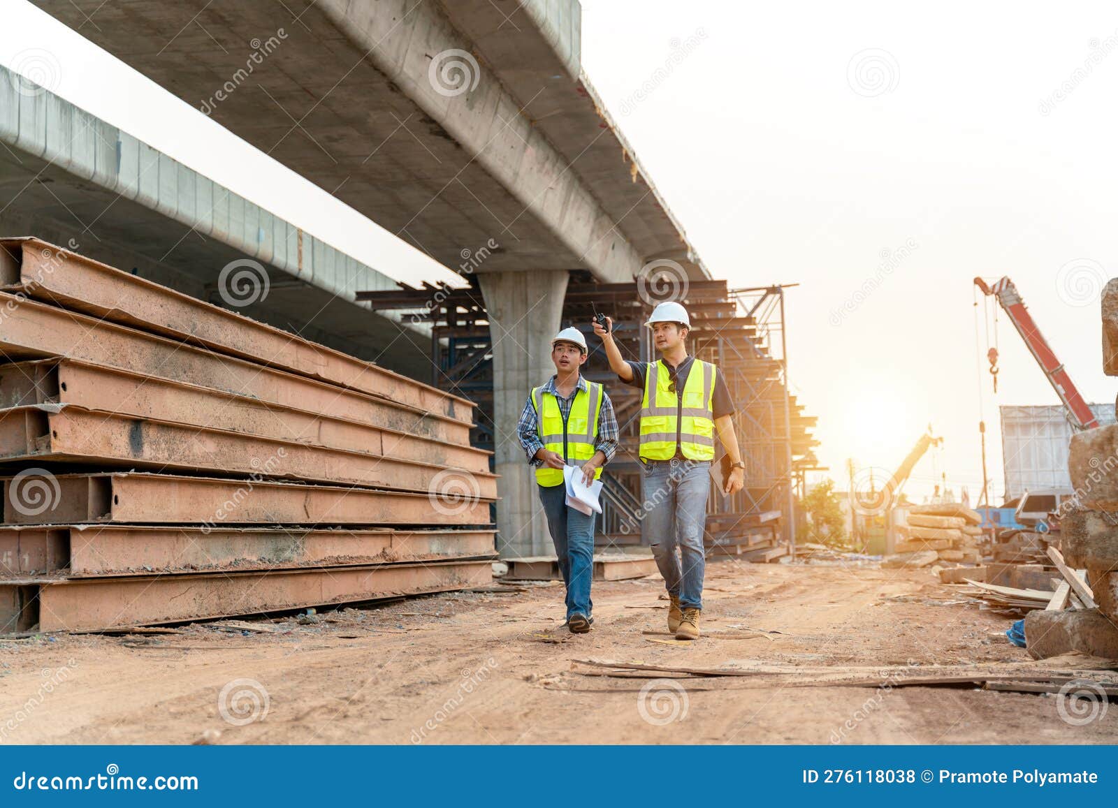 Apprentice and Civil Engineer at Road Construction Site, Industrial ...