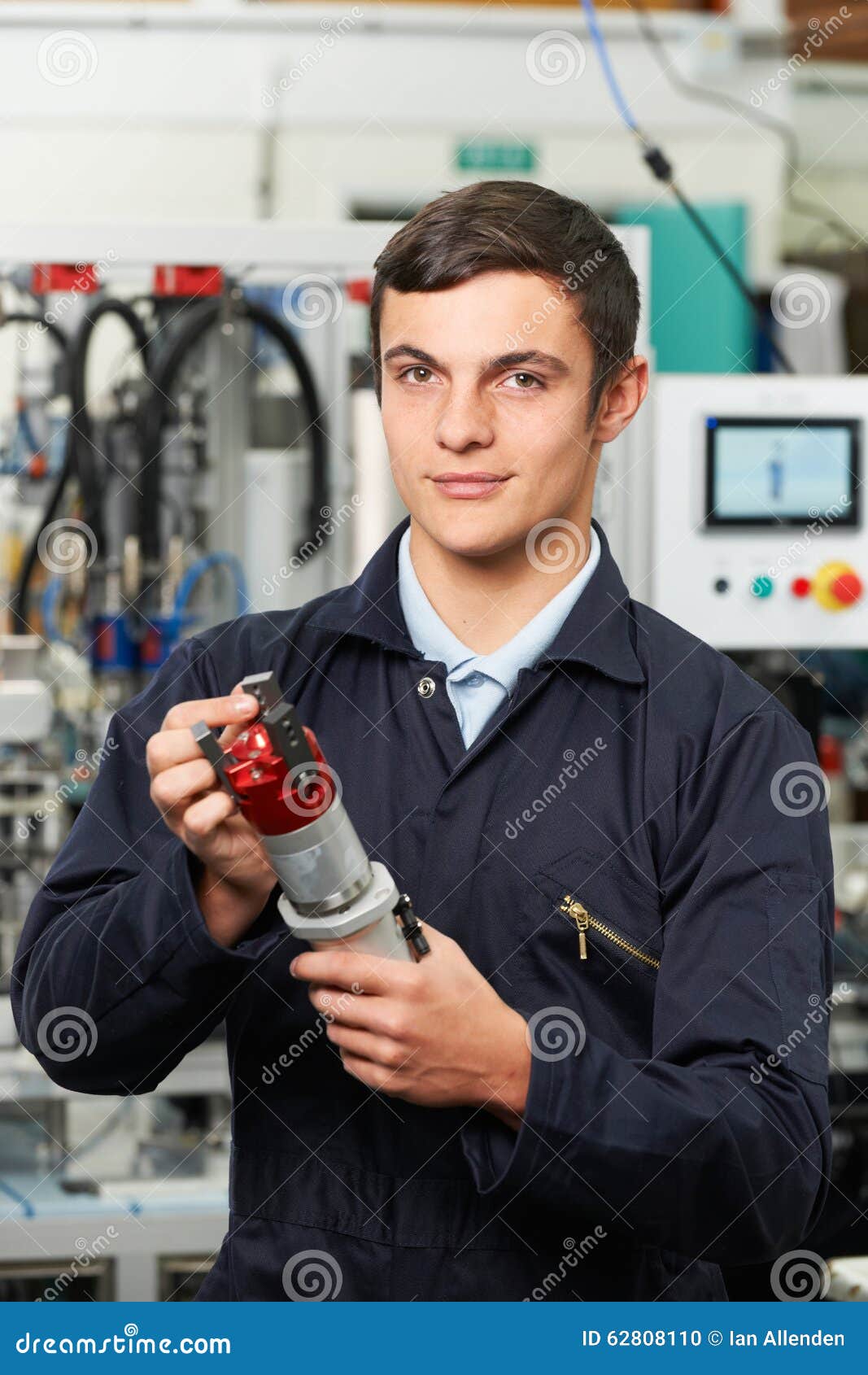 Apprentice Engineer Checking Component in Factory Stock Photo - Image ...