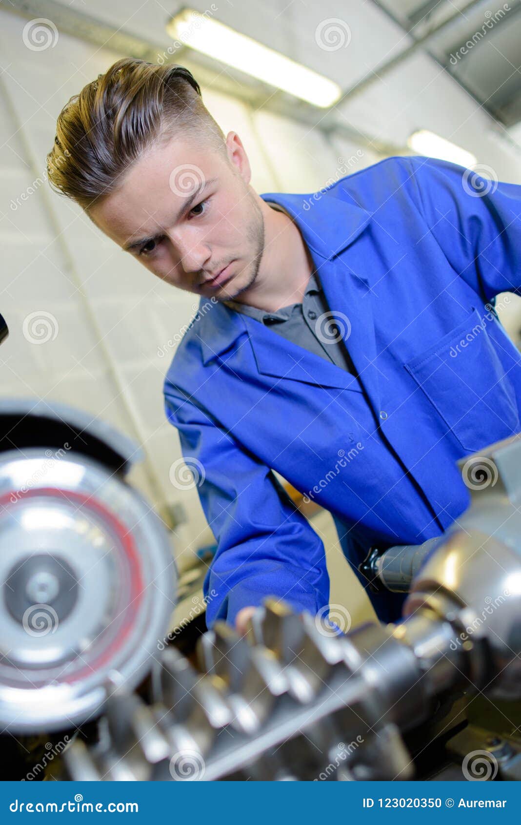 Apprentice Engineer with Metal Gear Stock Photo - Image of circular ...