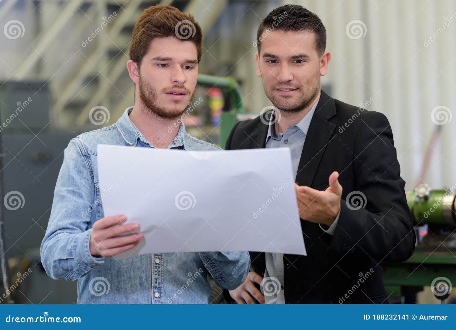 Apprentice Engineer Showing Idea To Mentor Stock Image - Image of ...