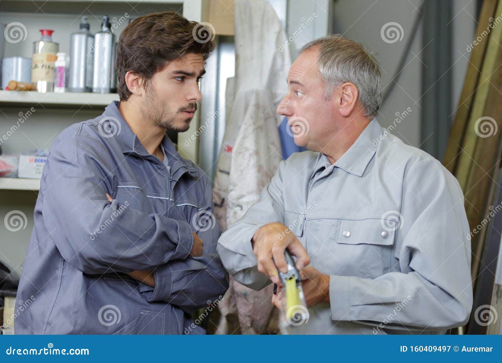 Apprentice Engineer Working on Factory Floor Stock Image - Image of ...