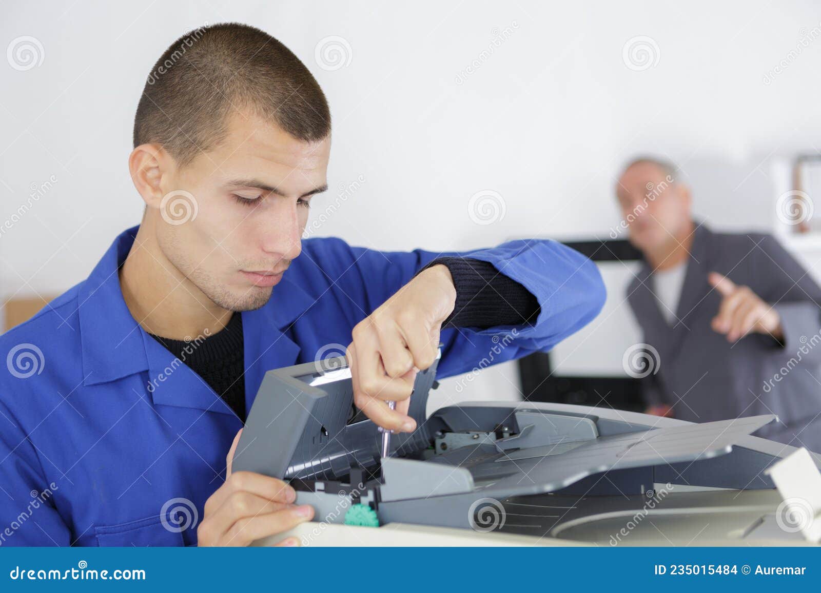 Apprentice fixing printer stock photo. Image of circuit - 235015484