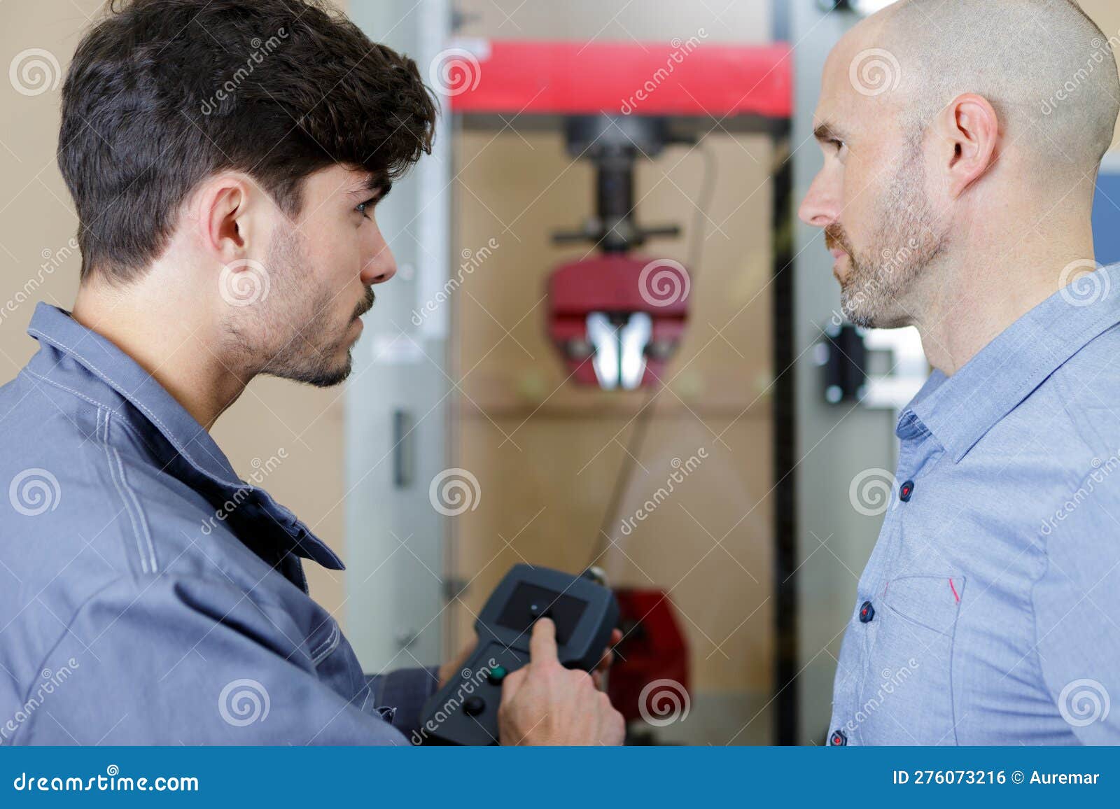 Apprentice Learning How To Use Controls To Machinery Stock Photo ...